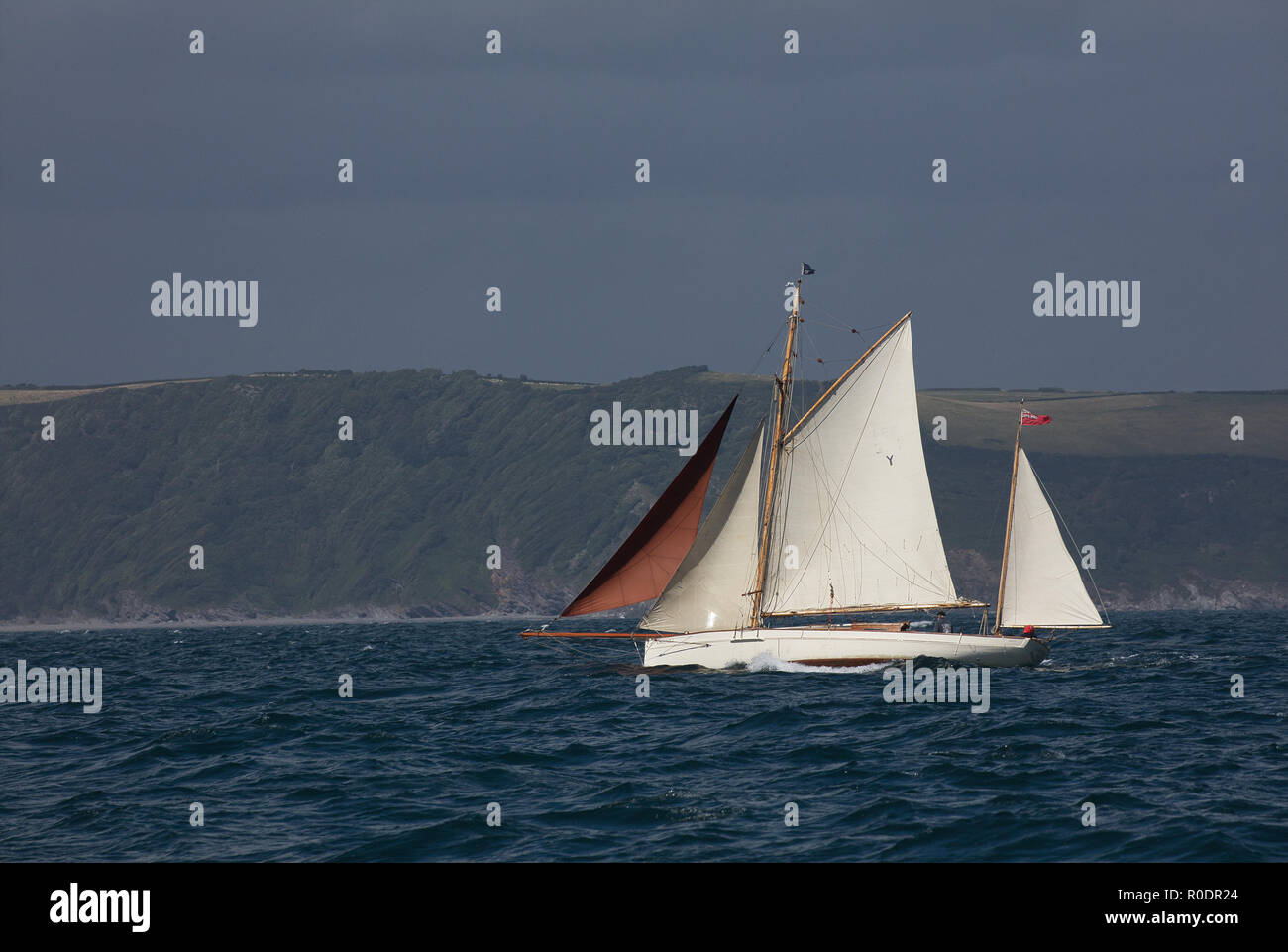 A classic yacht moving fast through the waves Stock Photo - Alamy