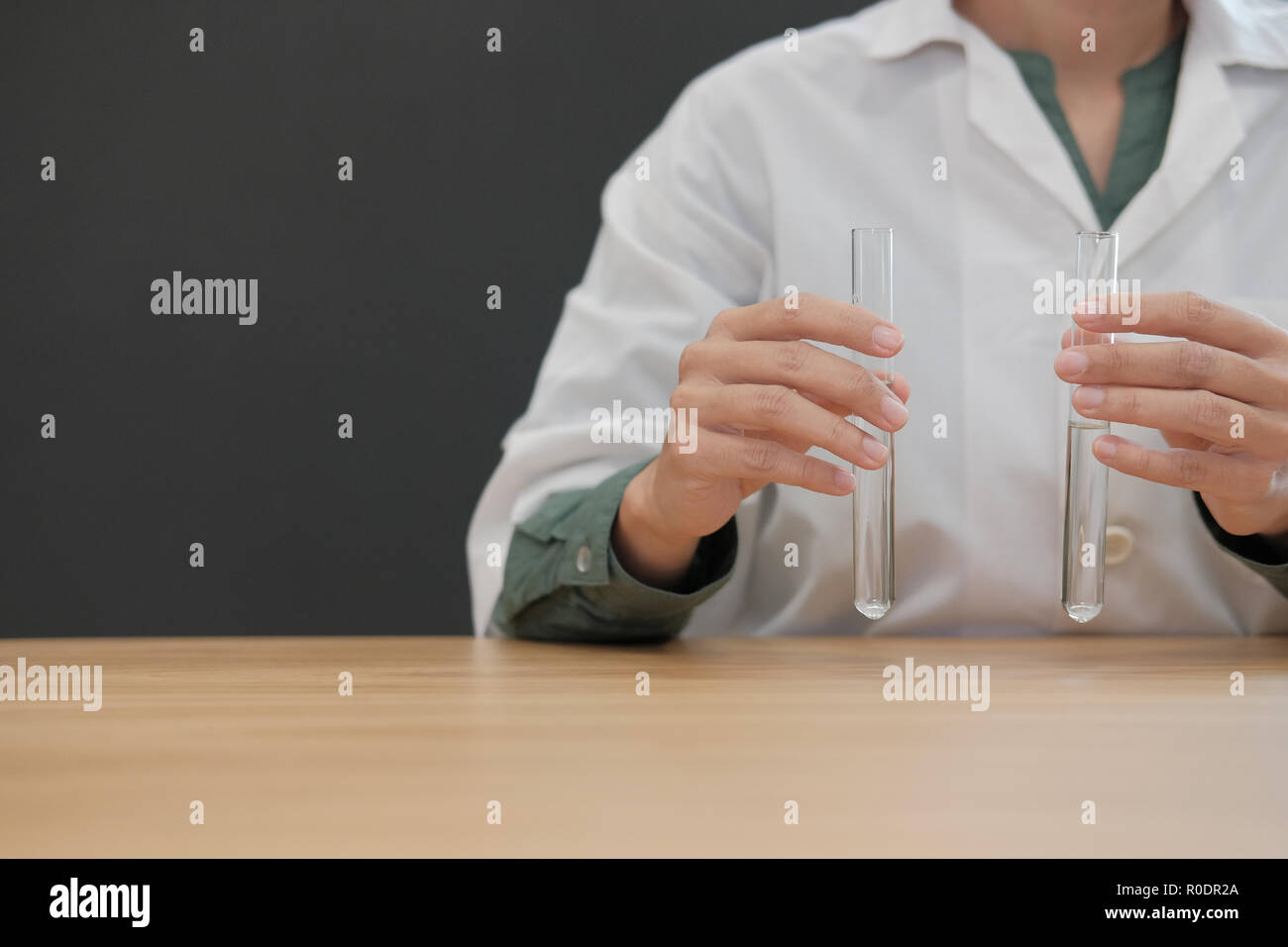scientist working with test tube. researcher doing research ...