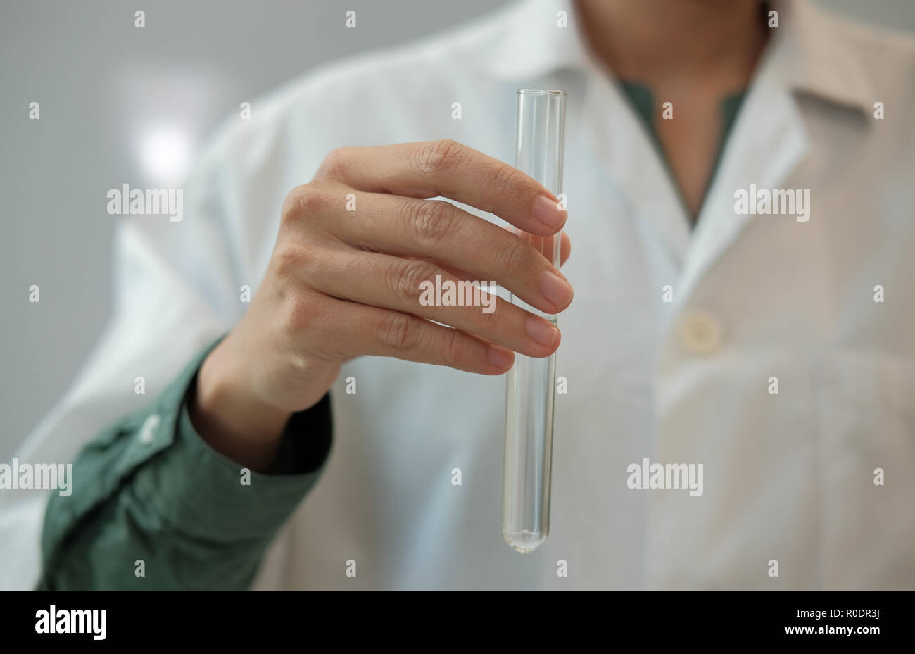 scientist working with test tube. researcher doing research ...