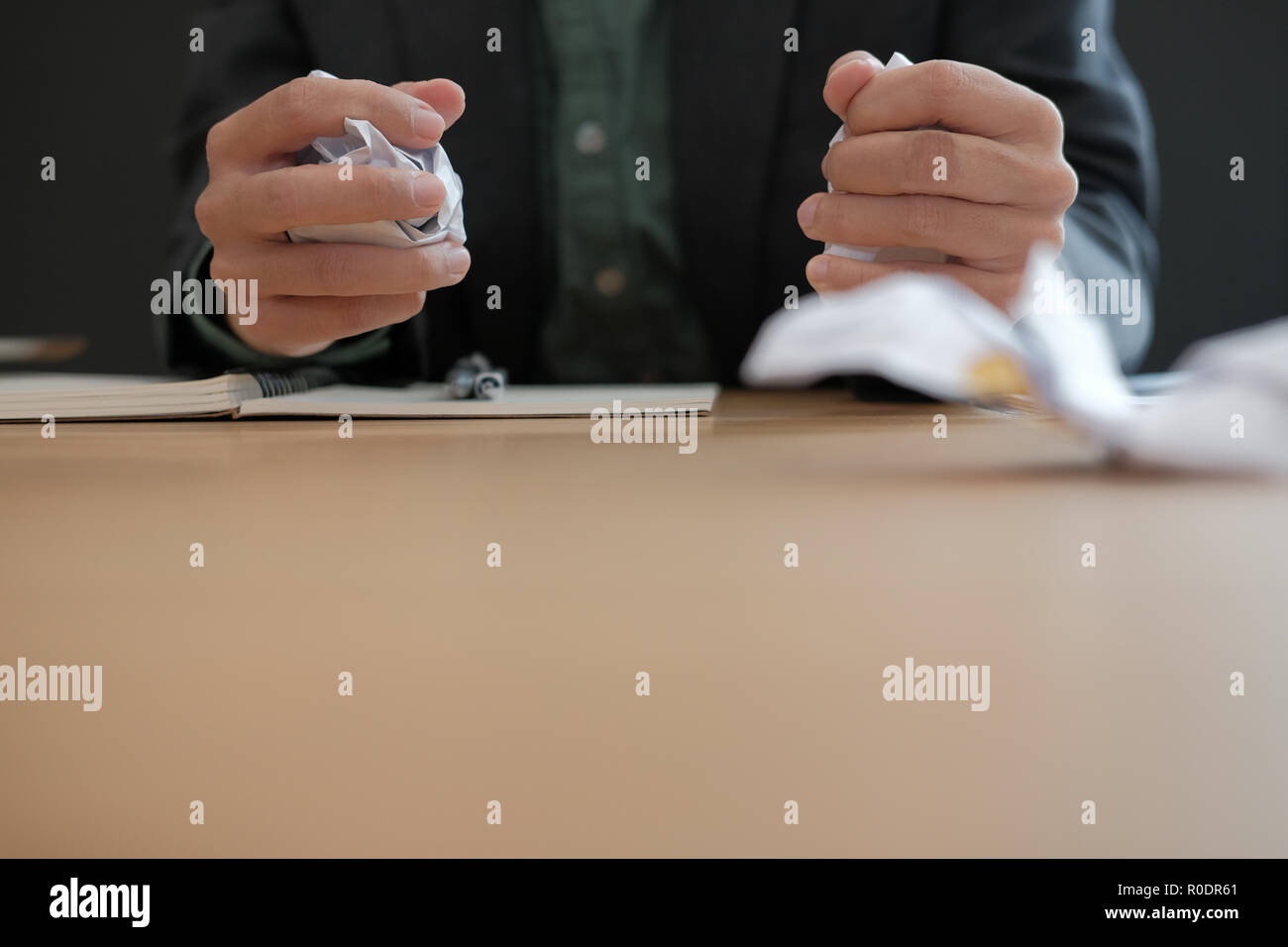 stressed upset angry businessman squeezing crumpling paper. stressful ...