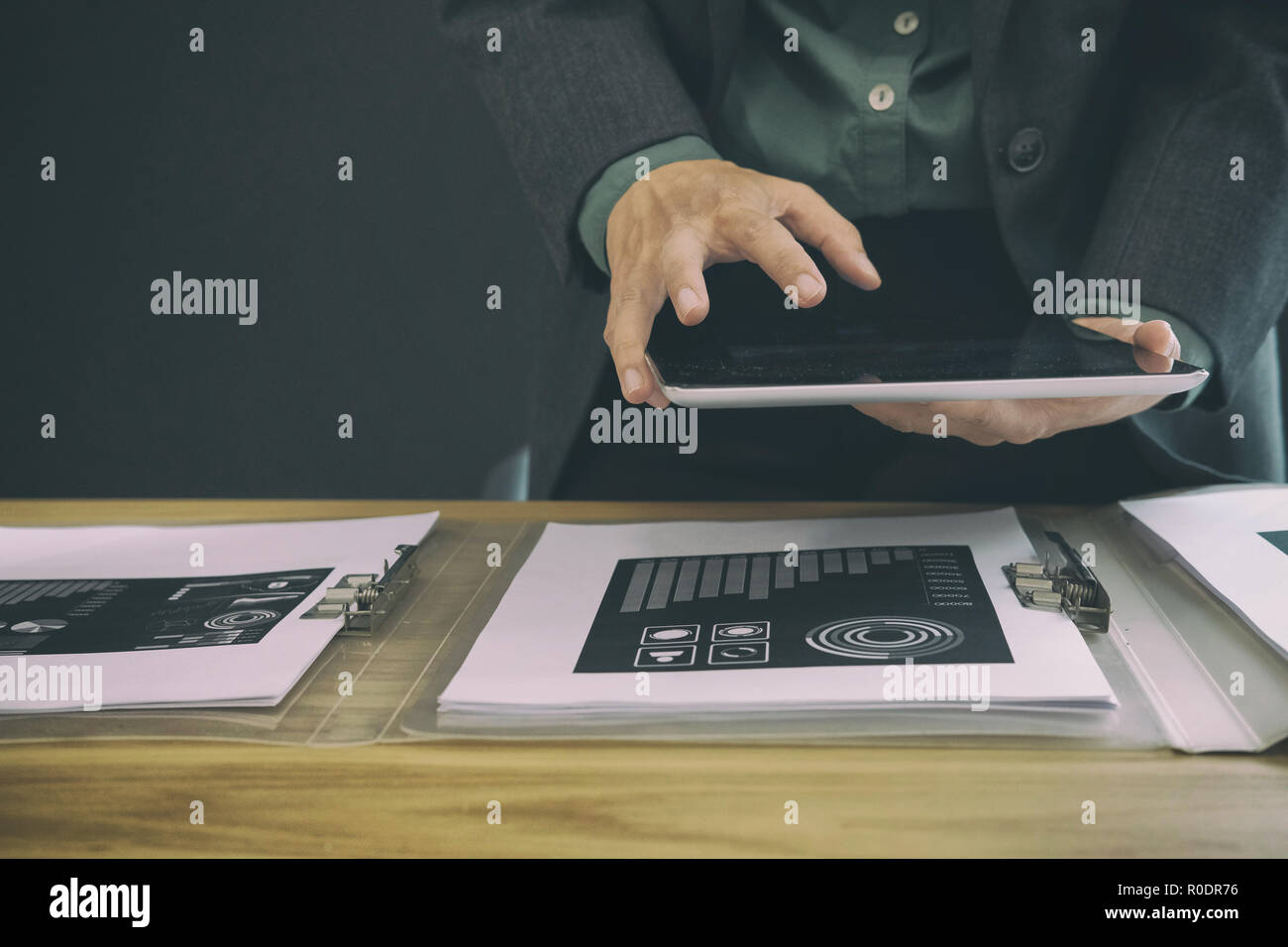 startup man analyzing data with tablet. businessman working at ...