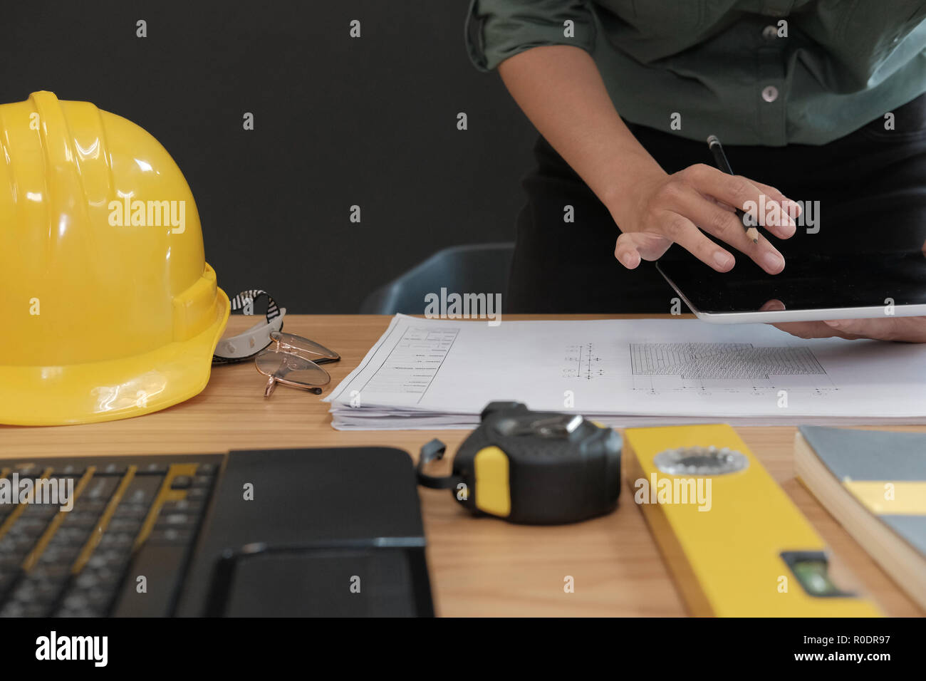 architect engineer working on house blueprint of real estate project at ...