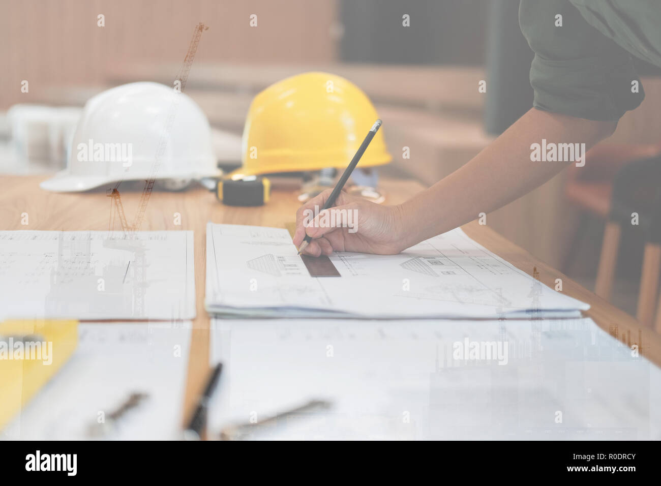 architect engineer working on house blueprint of real estate project at ...