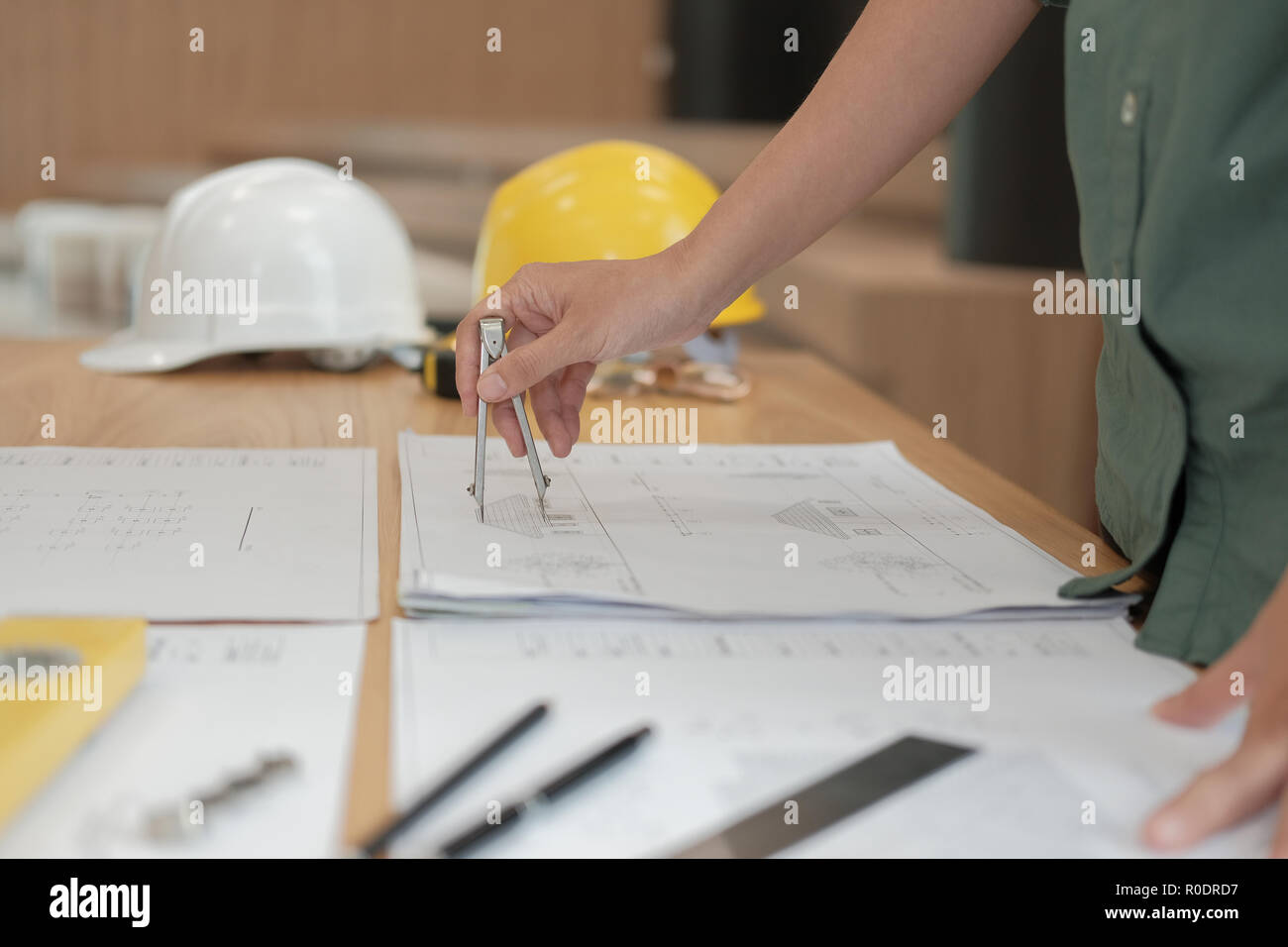 architect engineer working on house blueprint of real estate project at ...