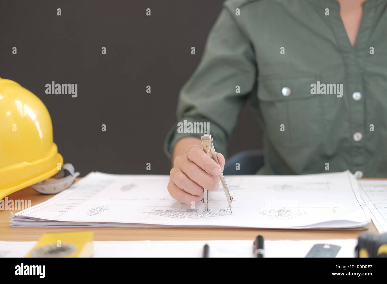 architect engineer working on house blueprint of real estate project at ...