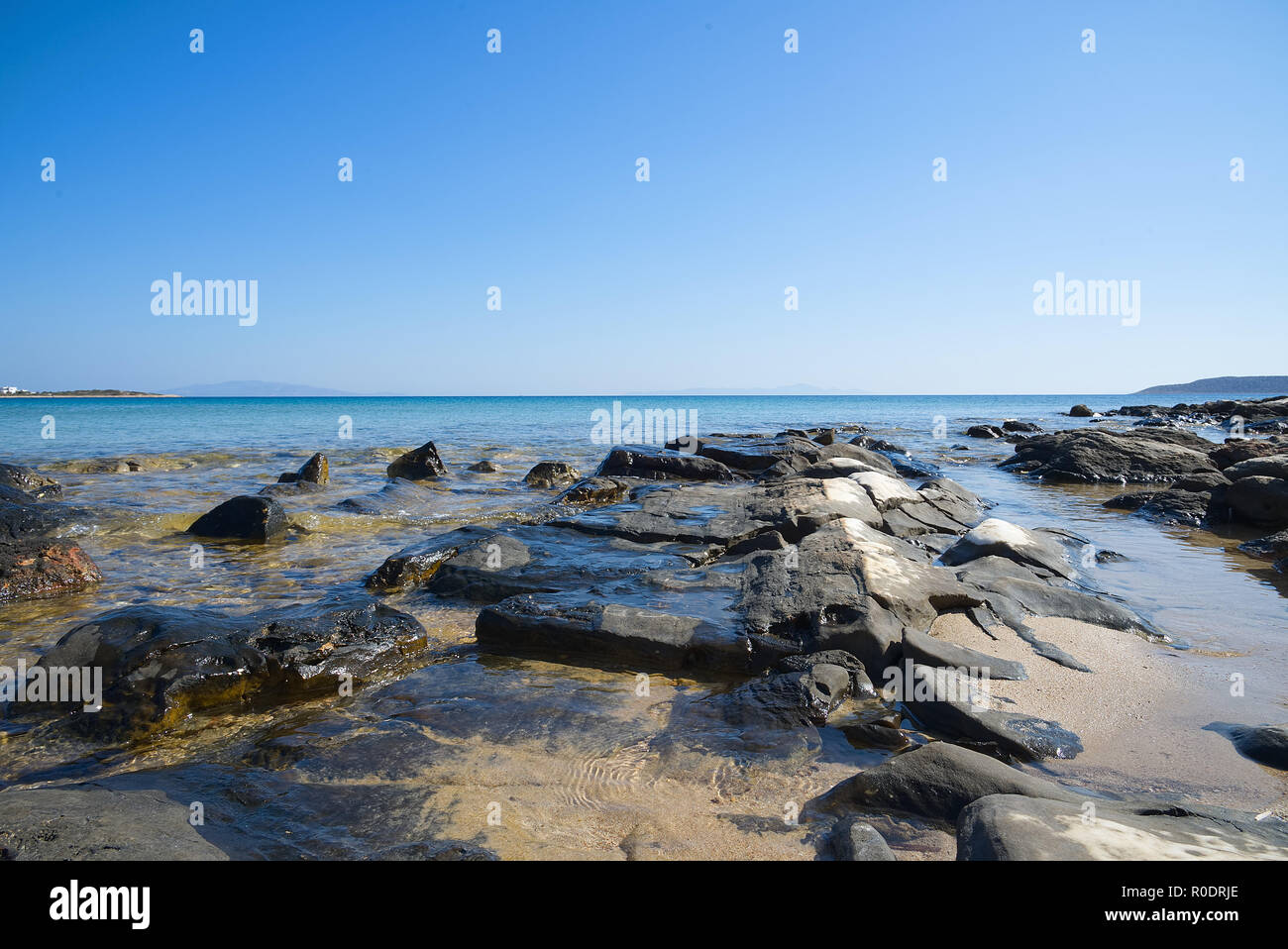 Aliki beach - Aegean sea - Paros Cyclades island - Greece Stock Photo ...