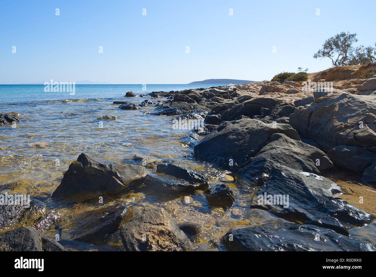 Aliki beach - Aegean sea - Paros Cyclades island - Greece Stock Photo ...