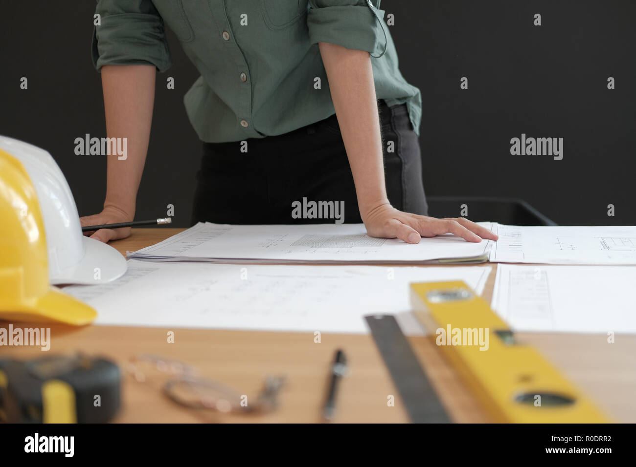 architect engineer working on house blueprint of real estate project at ...