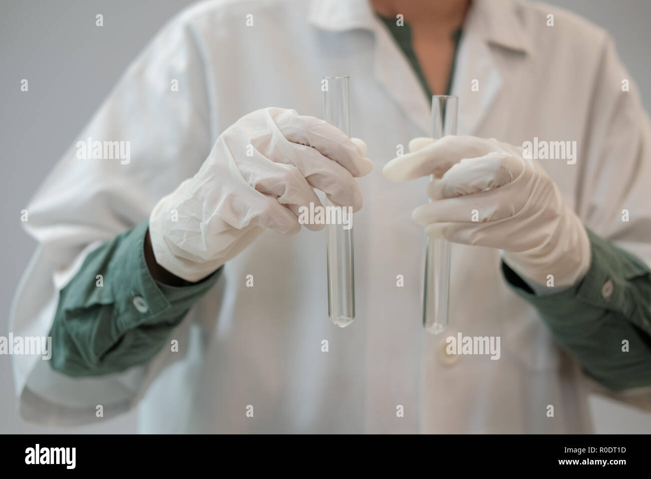 scientist working with test tube. researcher doing research ...