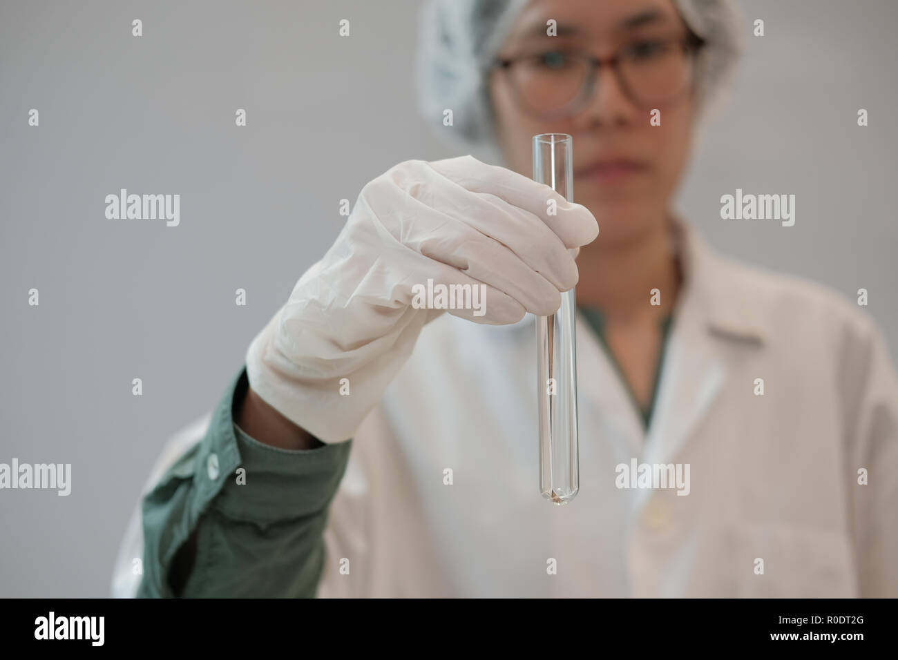 scientist working with test tube. researcher doing research ...