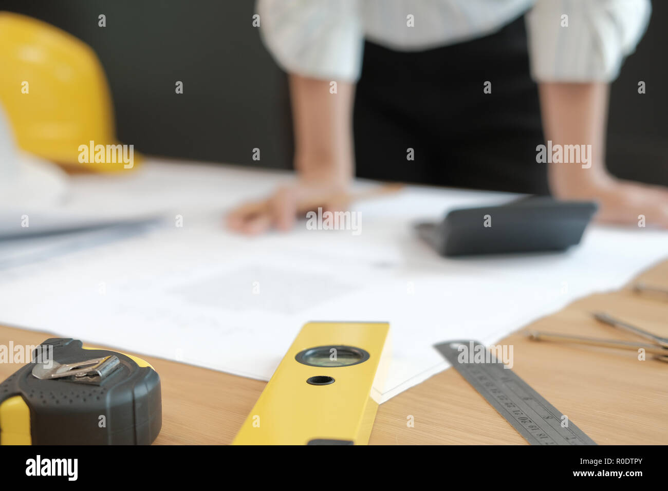 architect engineer working on house blueprint of real estate project at ...