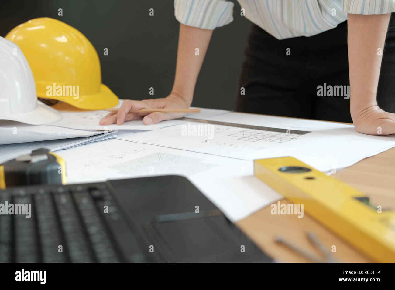 architect engineer working on house blueprint of real estate project at ...
