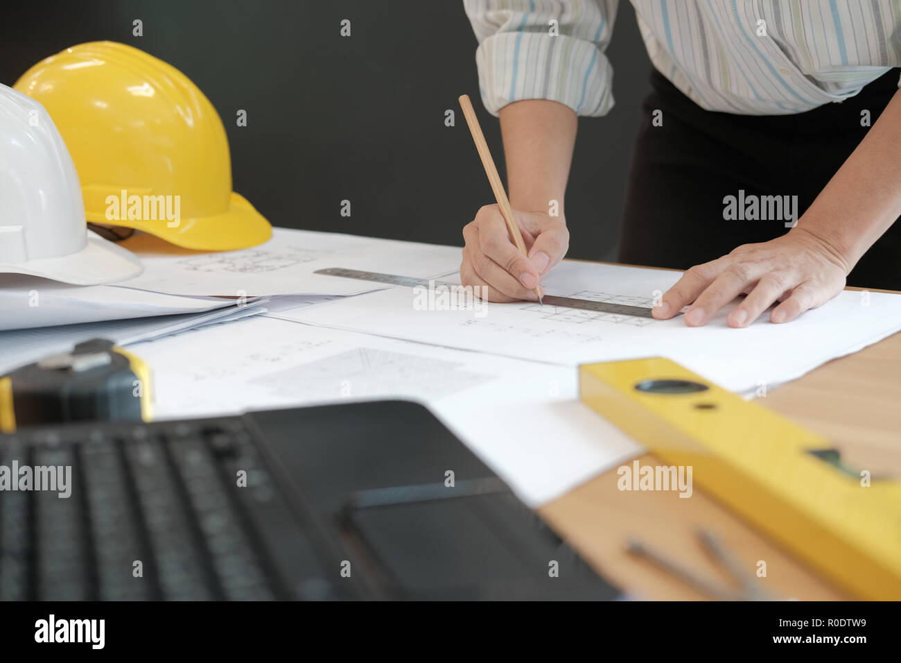 architect engineer working on house blueprint of real estate project at ...