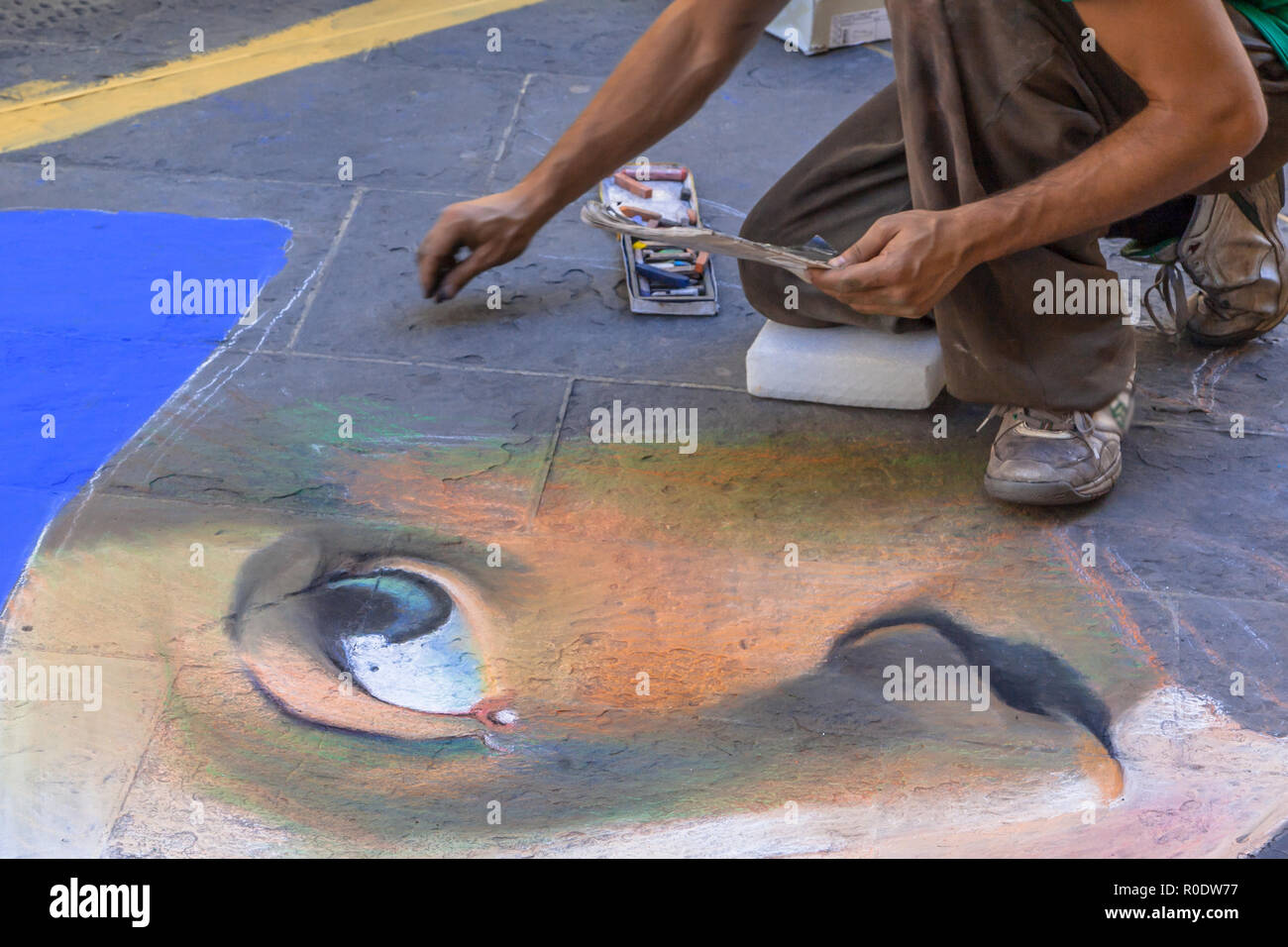 Street Artist Drawing a Portrait on the Pavement Stock Photo - Alamy