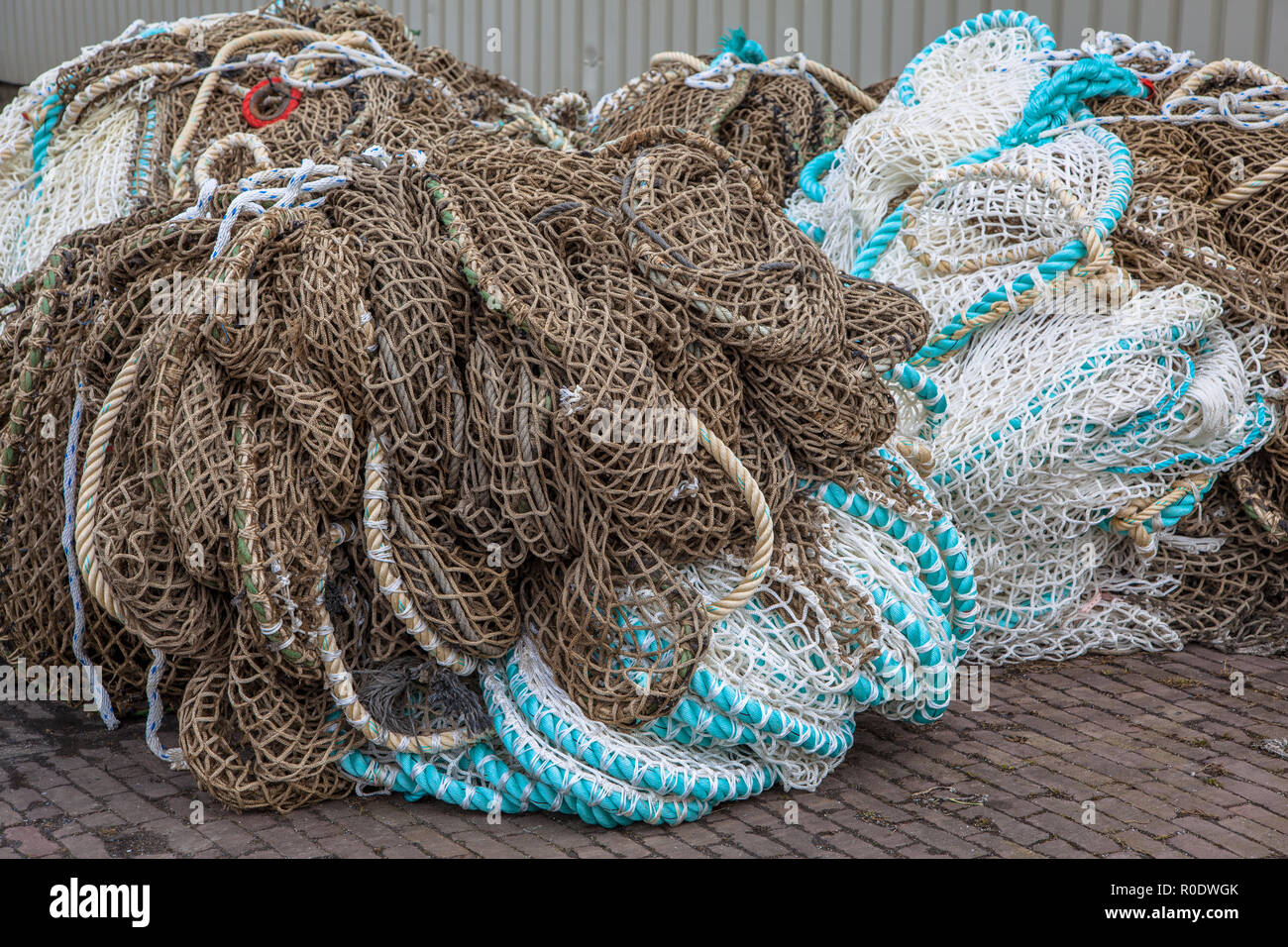 Heap of commercial fishing nets hi-res stock photography and images - Alamy