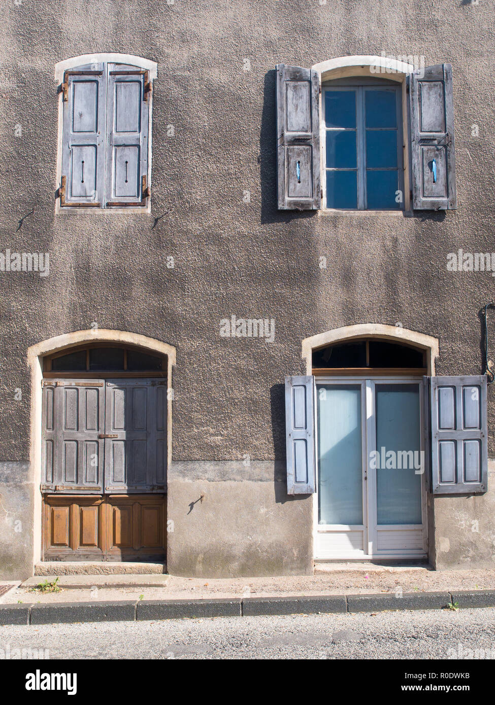 Facade of an Old French House With Window Panes and Window Shutters ...
