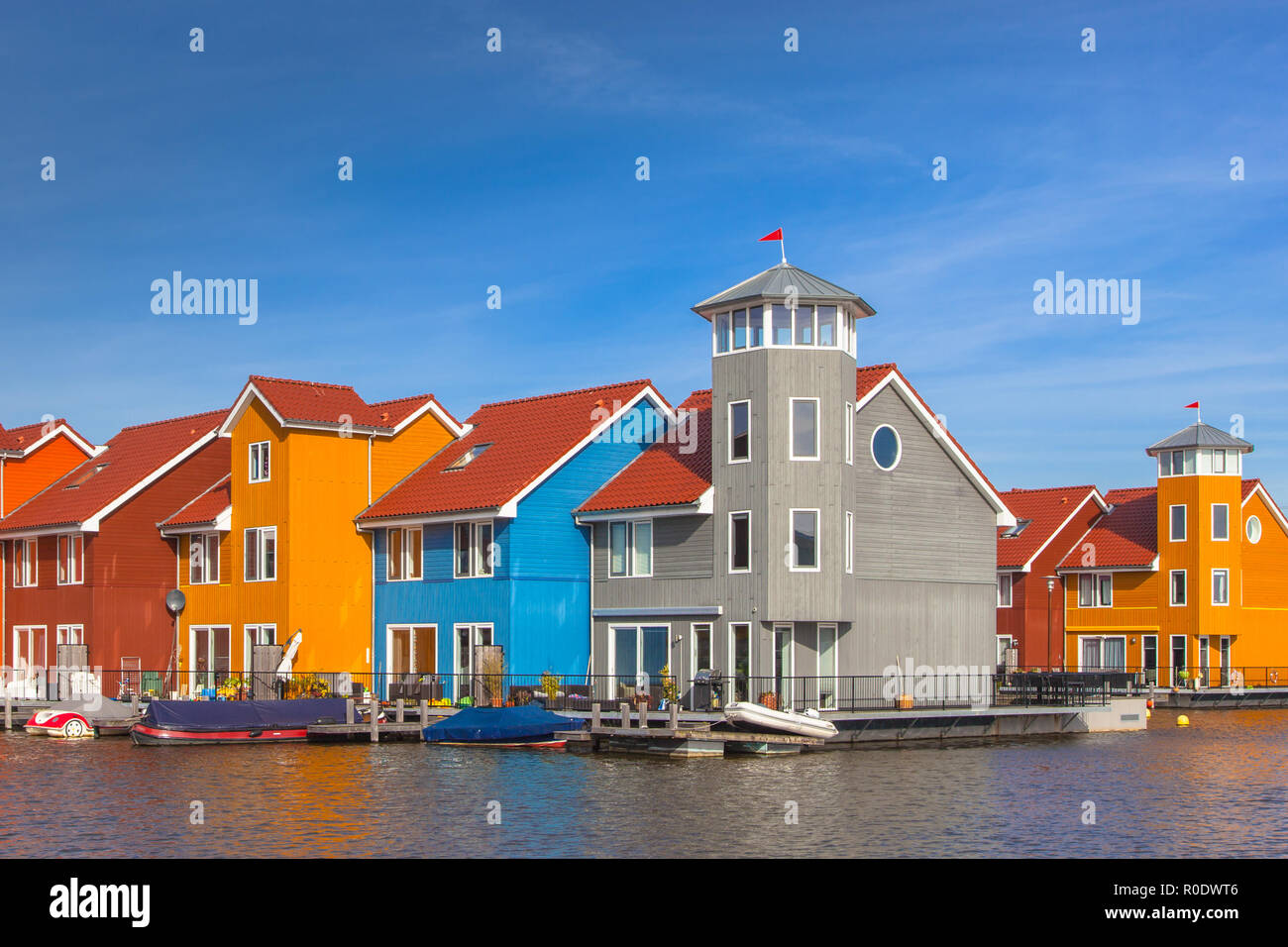 Colorful houses reitdiephaven harbor hi-res stock photography and ...