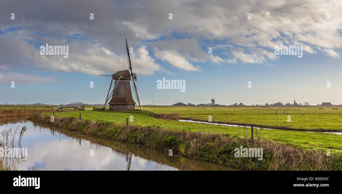 Traditional wooden windmill in Frisian countryside, Netherlands Stock ...