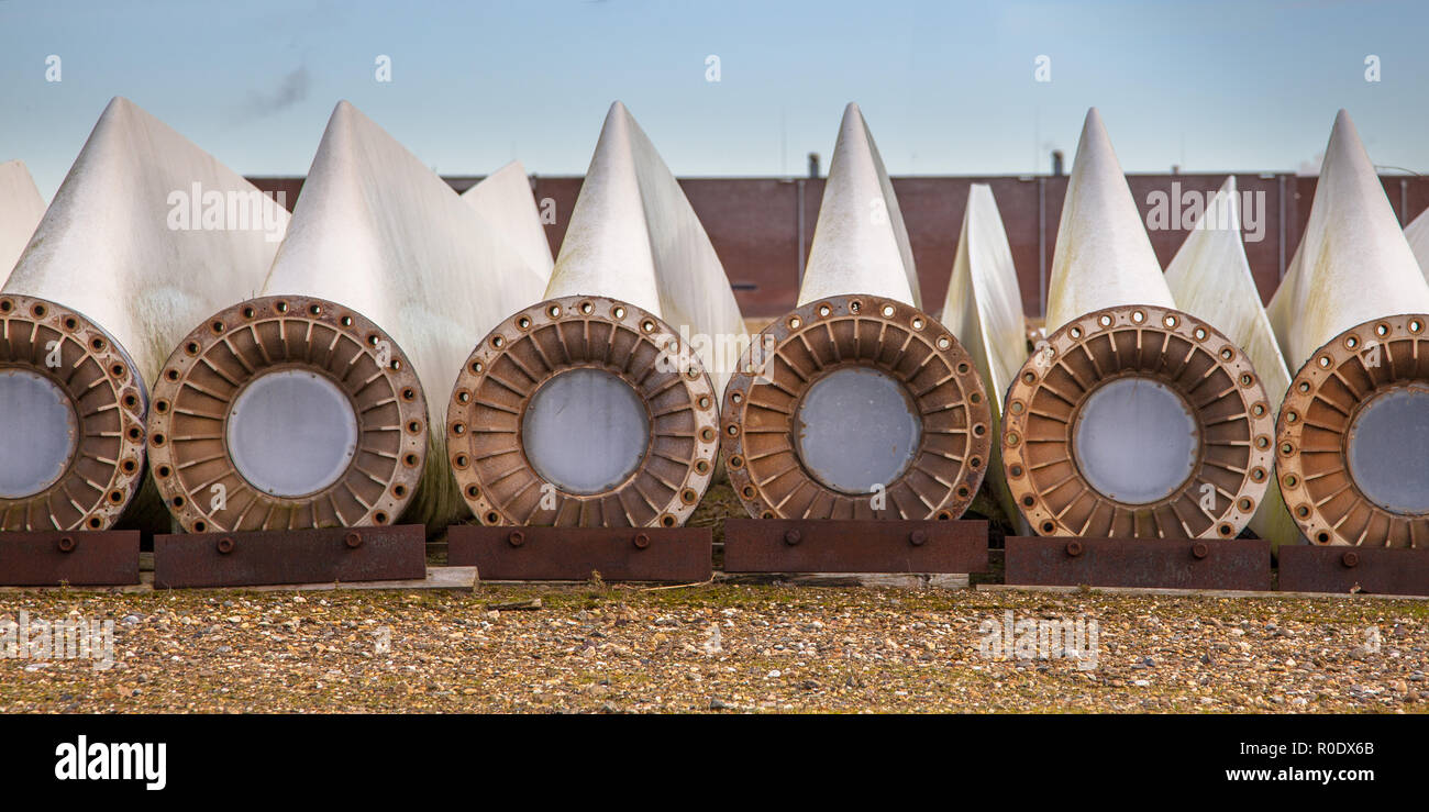A row of spare wind turbine wings on wins turbine maintenance yard ...