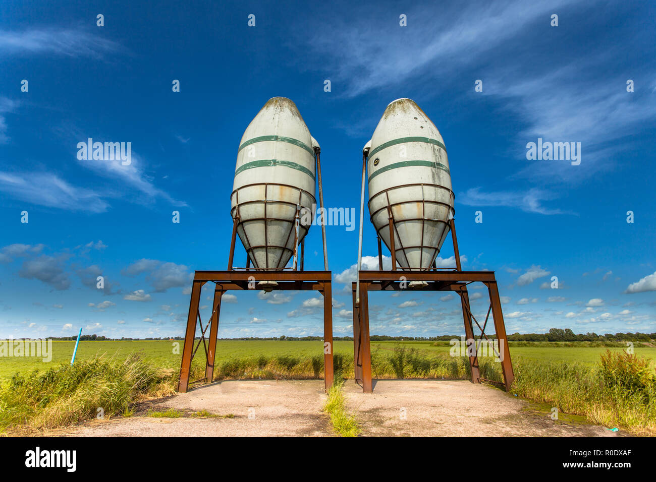 Two Fertilizer Silos in a Green Summer Field in The Netherlands Stock ...