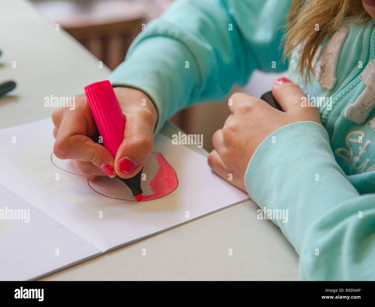 Student Writing in Notebook during Lesson on School Stock Photo - Alamy