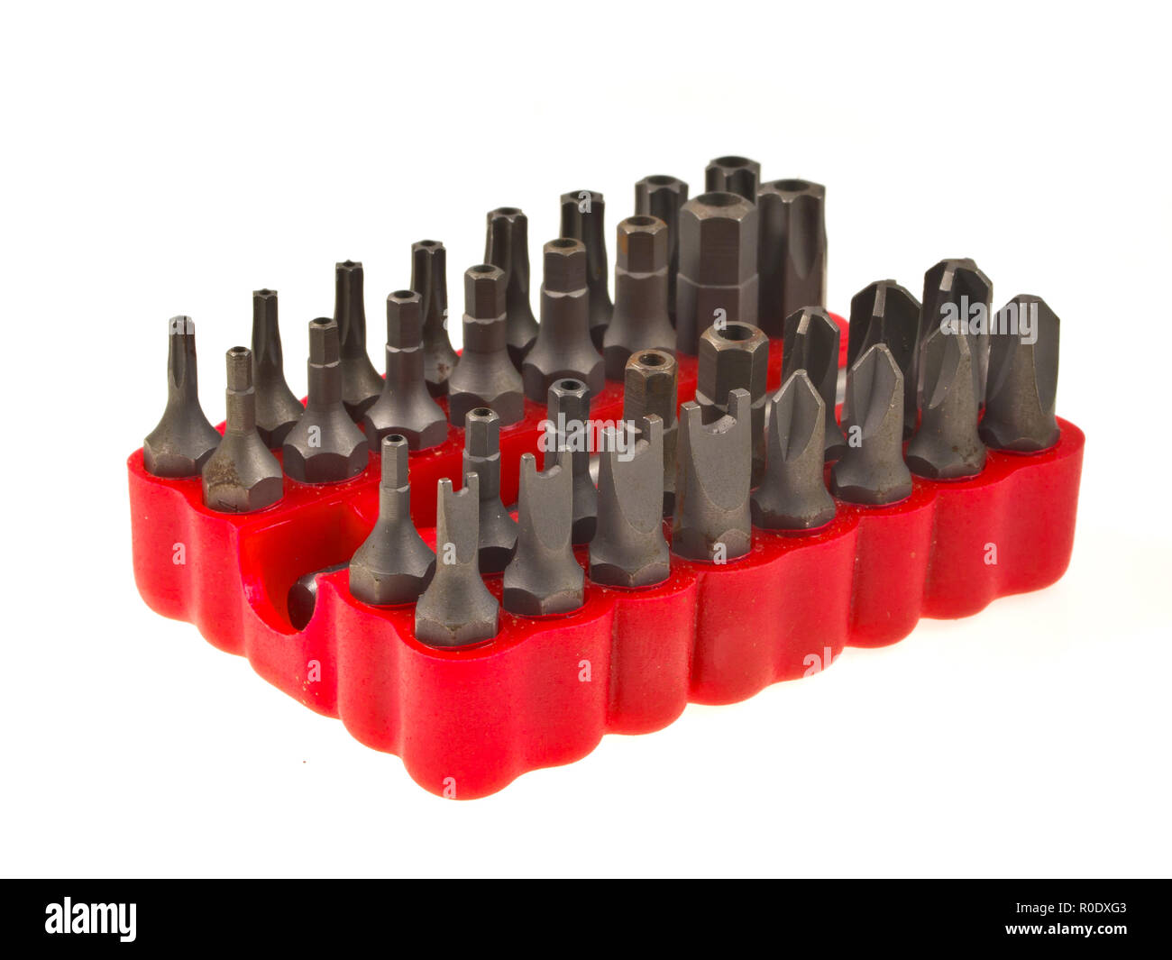 Set of screwdriver bits for in red organizer isolated on white ...