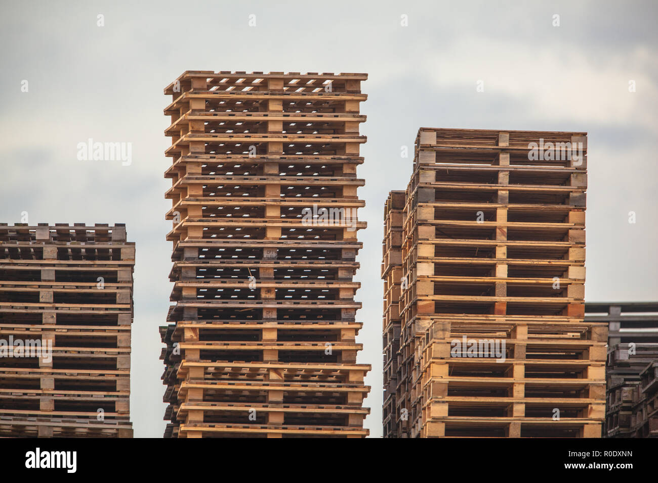 Stacks of used Wooden Euro Pallets at a Recycling Depot Stock Photo - Alamy