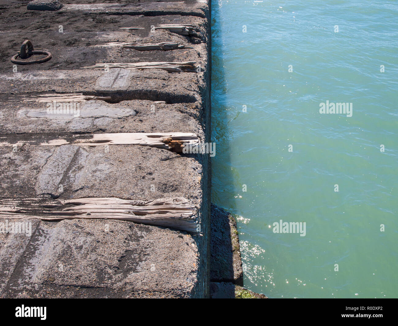 Stone Landing Point at the Ocean Shore with Iron Mooring Ring Stock ...