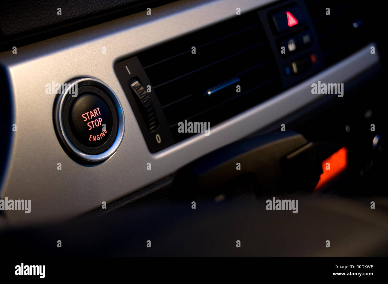 Start Button and Dashboard of a Luxury Automobile Stock Photo - Alamy