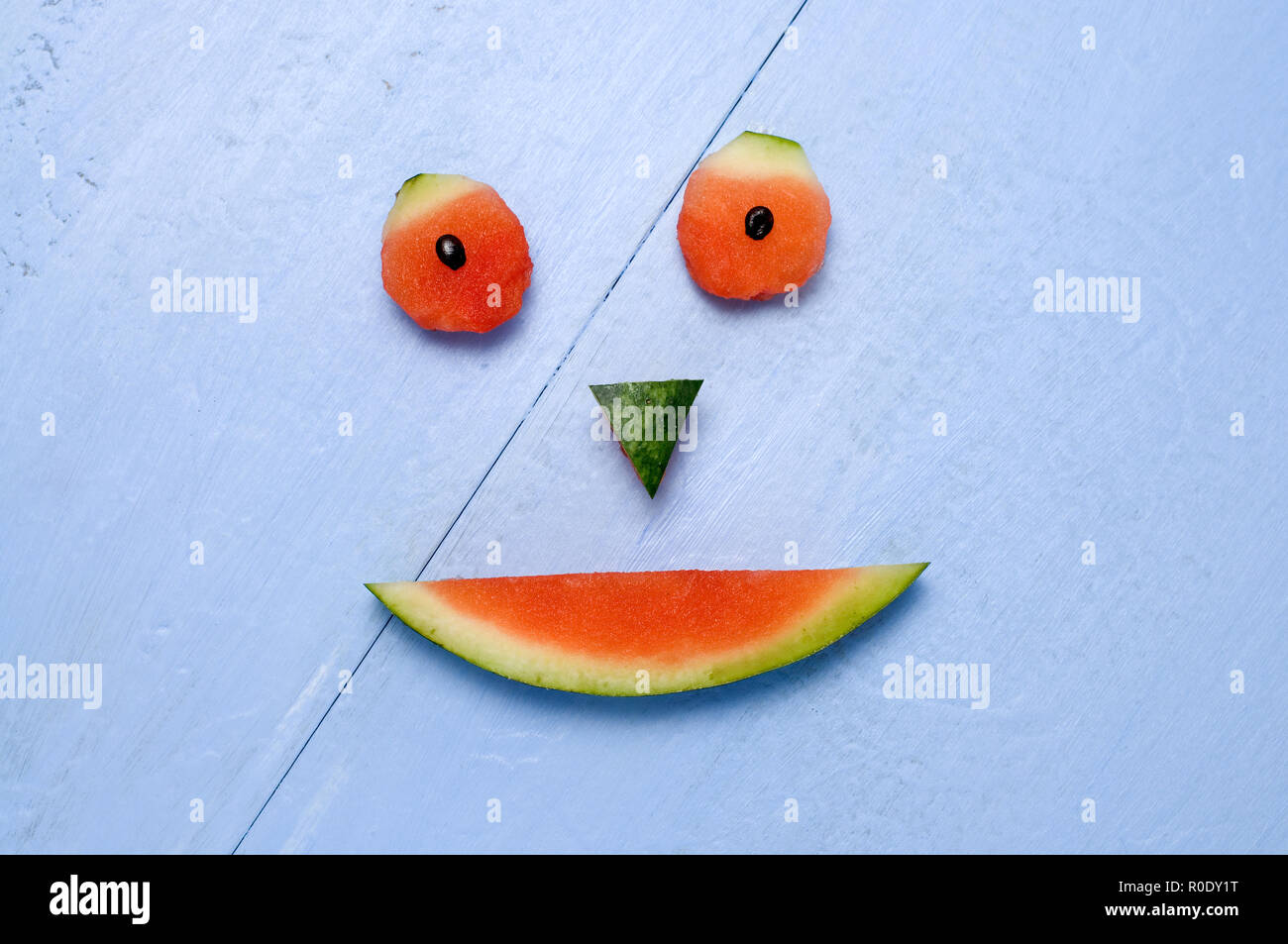 Funny Face Made with Fresh Watermelon on Light Blue Background Stock ...