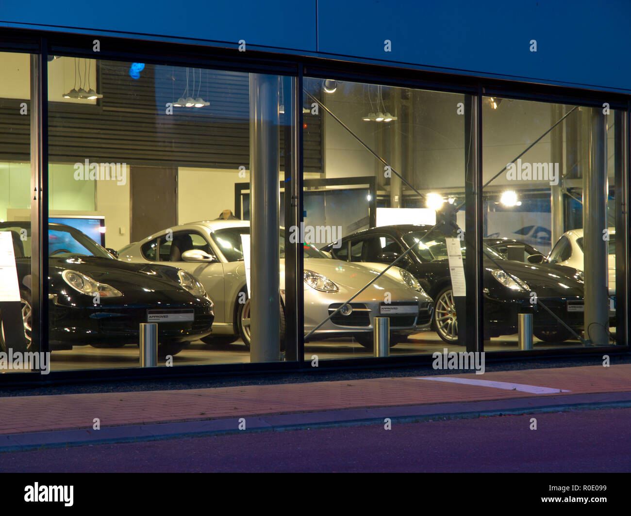 Row of modern luxury cars hi-res stock photography and images - Alamy
