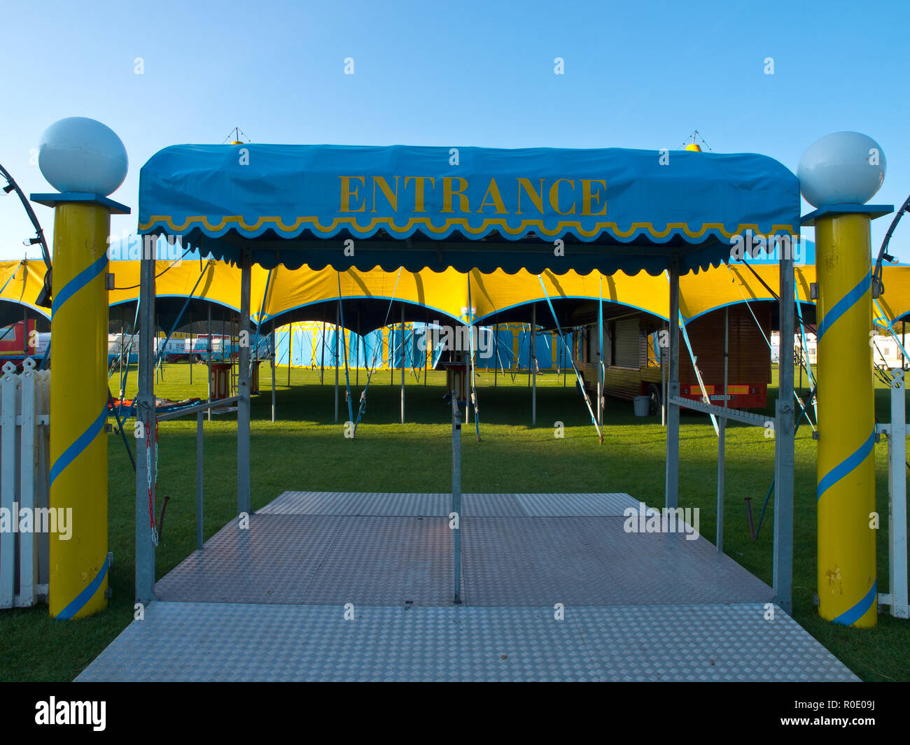 Entrance yellow and blue big top circus tent detail Stock Photo - Alamy