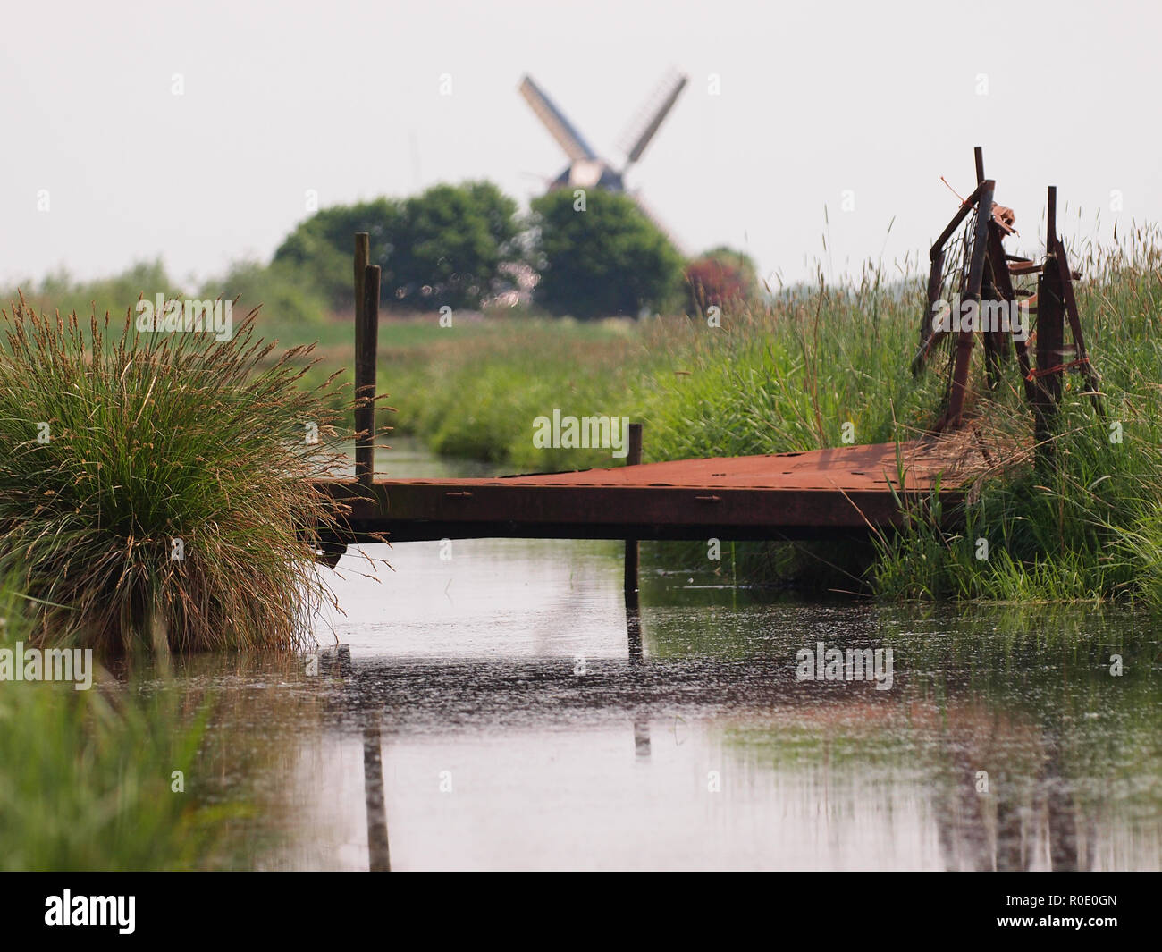 Rusty bridge in rural landscape Stock Photo - Alamy