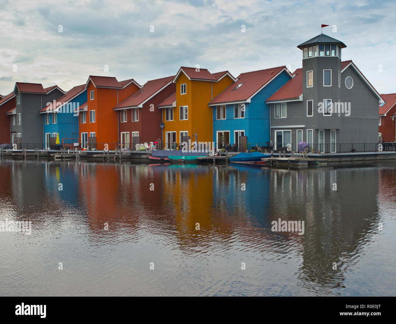 House in many color on waterfront Stock Photo - Alamy