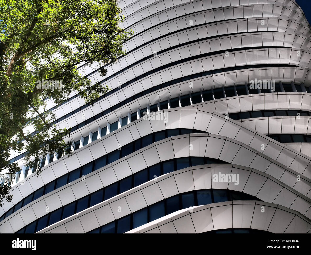 Tall modern architecture officebuilding Stock Photo - Alamy