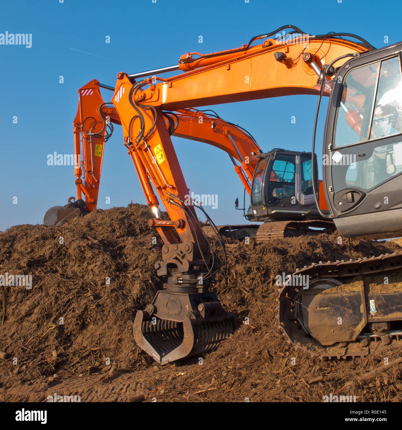 Excavators dig on construction site hi-res stock photography and images ...