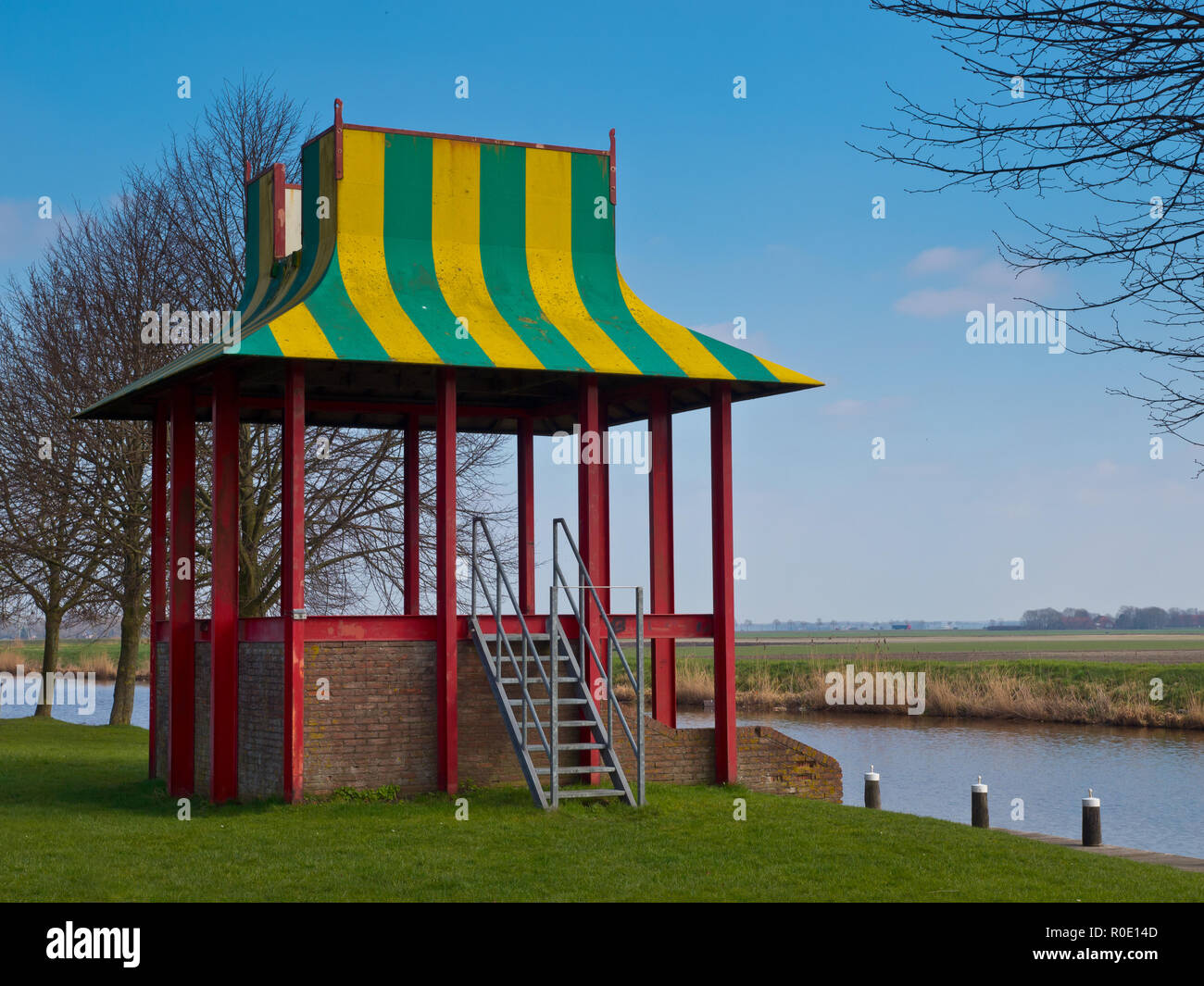 Colorful modern music chapel on the river bank Stock Photo - Alamy