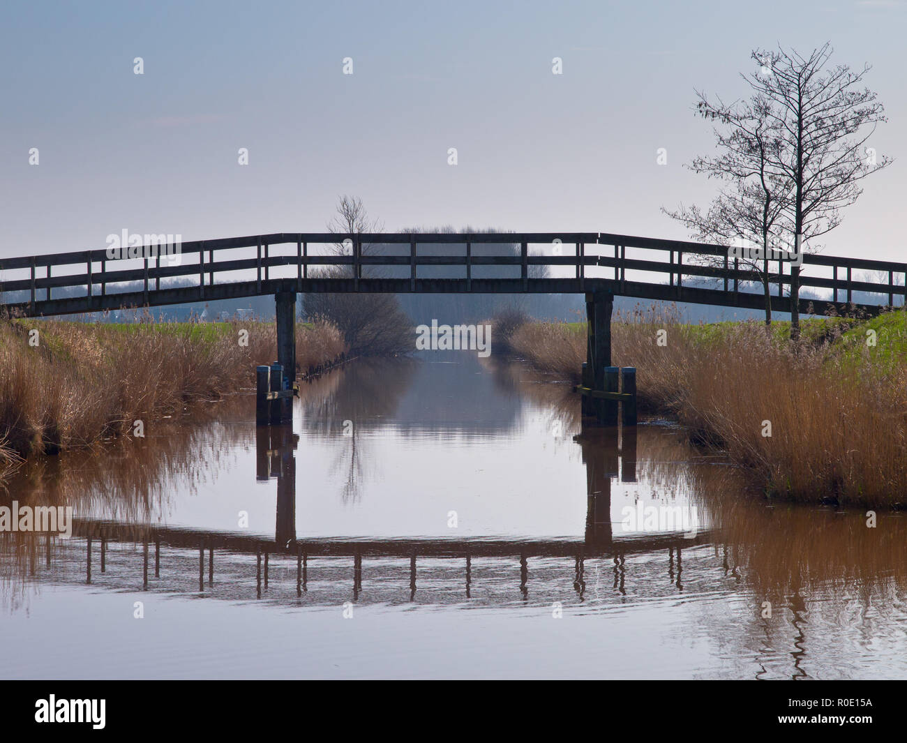 Wooden bridge over a ditch hi-res stock photography and images - Alamy