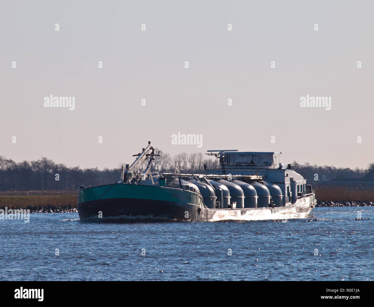 Oil tanker transporting oil on a european river Stock Photo - Alamy
