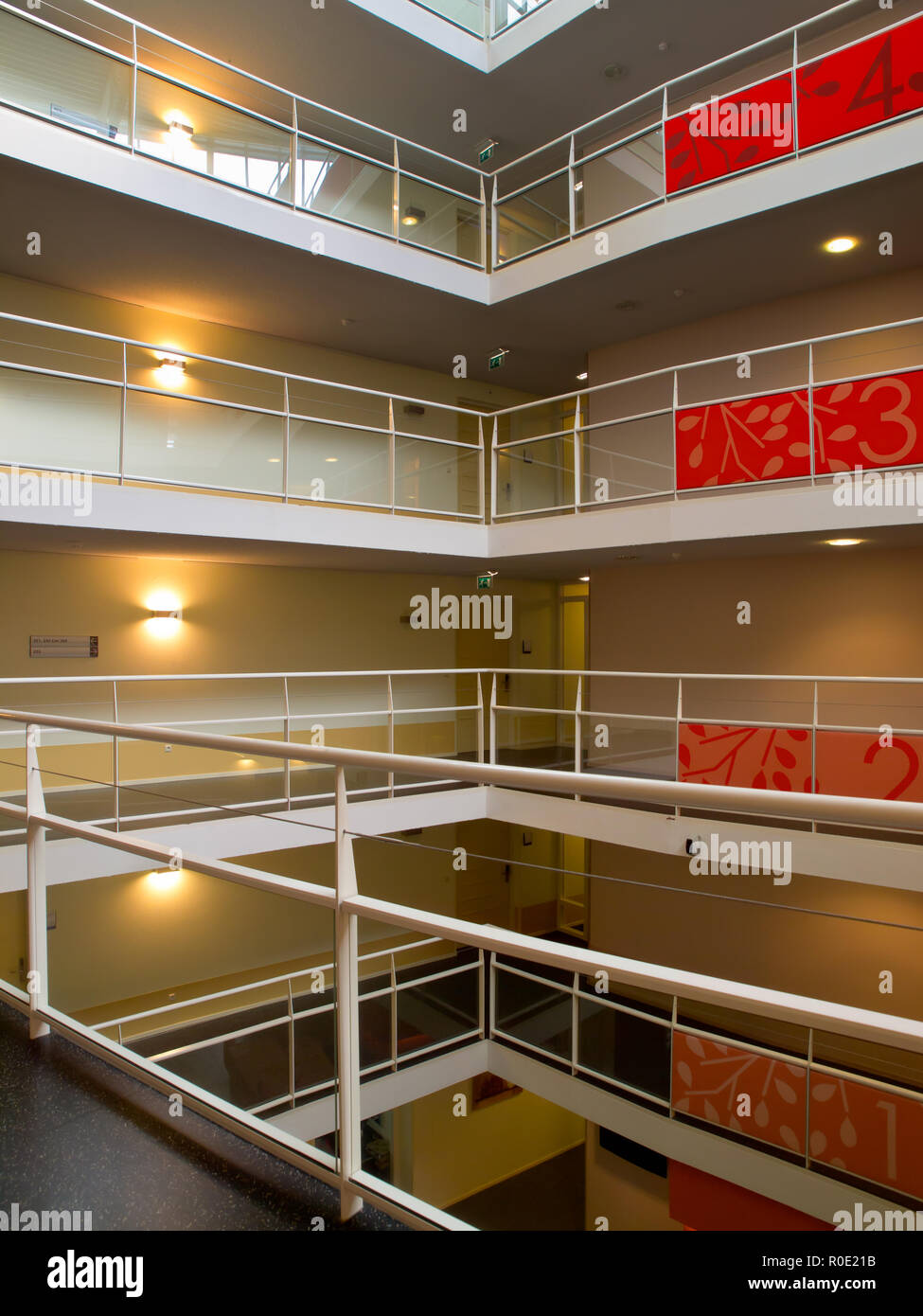 A modern indoor glass gallery with walkway and doors Stock Photo - Alamy