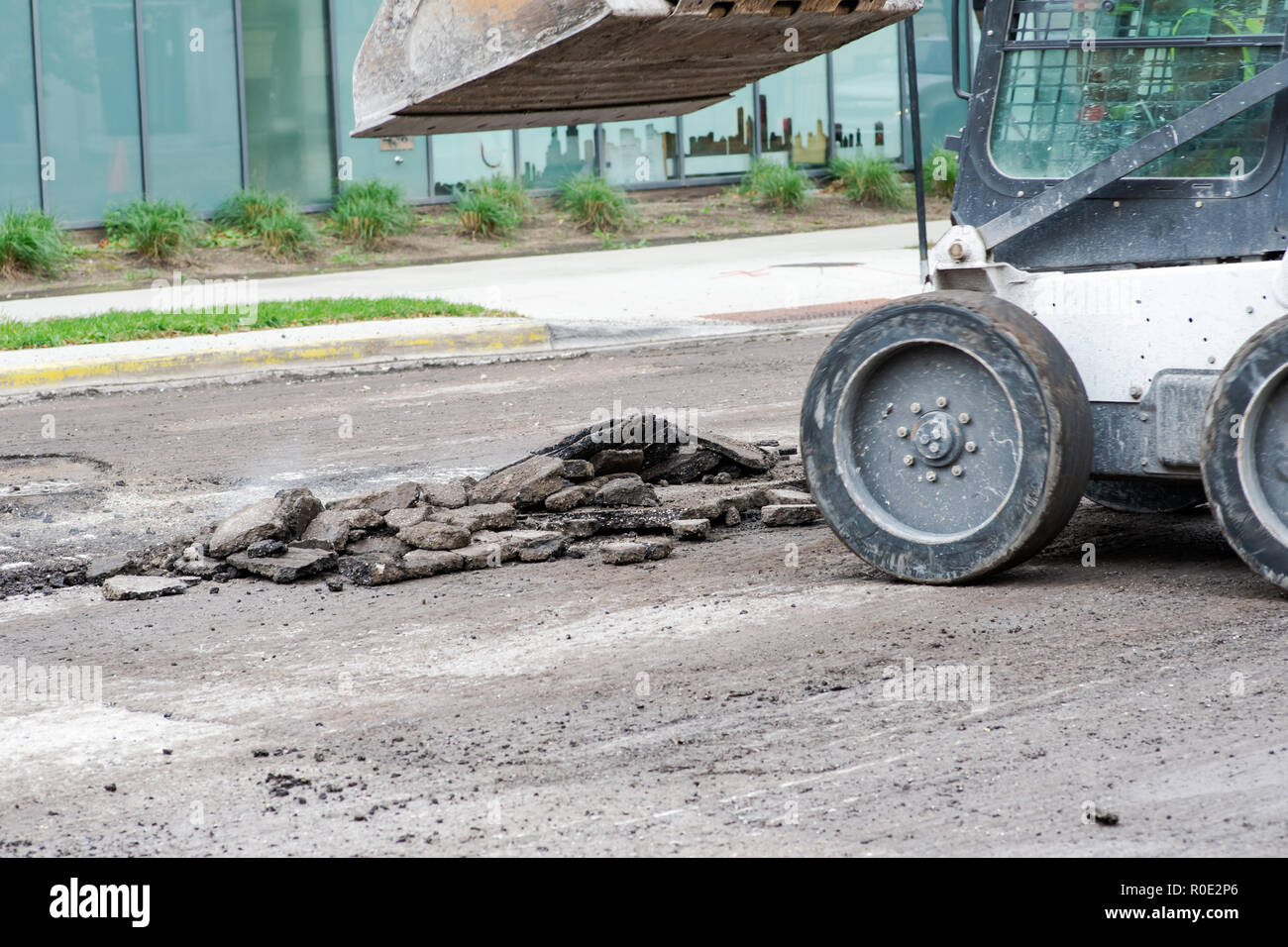 Roadwork, removal of old paving from asphalt. Fixing road for better ...