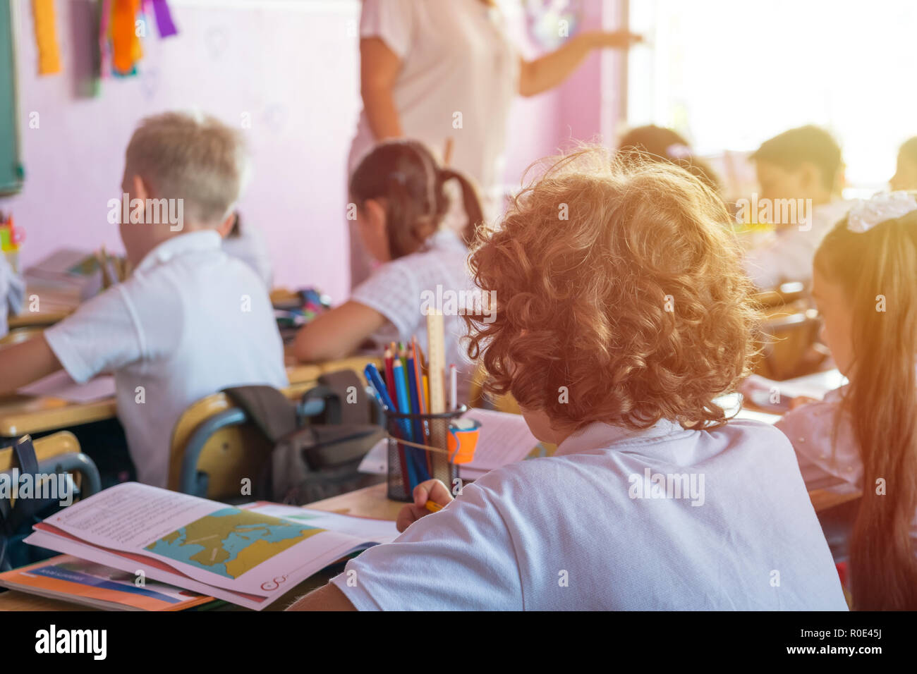 children actively participate in the class, read and listen to the ...