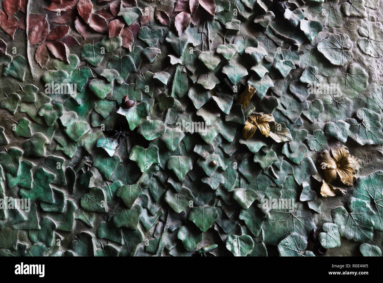 Fine detail of flowers and insects on one of the doors of the Sagrada ...