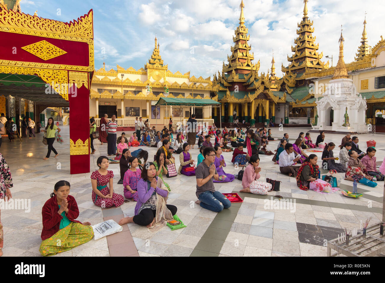 RANGOON, MYANMAR - JANUARY 18, 2017 : Burmese people sitting and ...