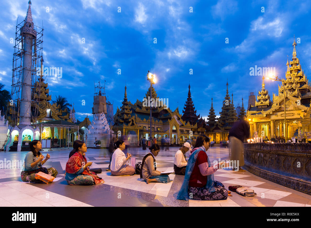 RANGOON, MYANMAR - JANUARY 18, 2017 : Burmese people sitting and ...