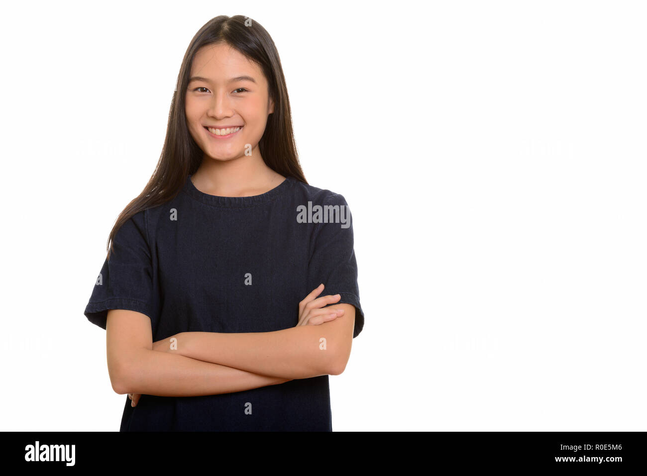 Portrait of young happy Asian teenage girl smiling Stock Photo - Alamy