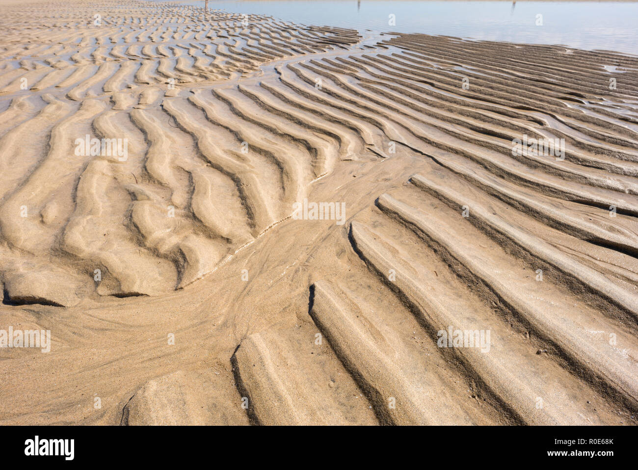 Ripples on sand Stock Photo - Alamy