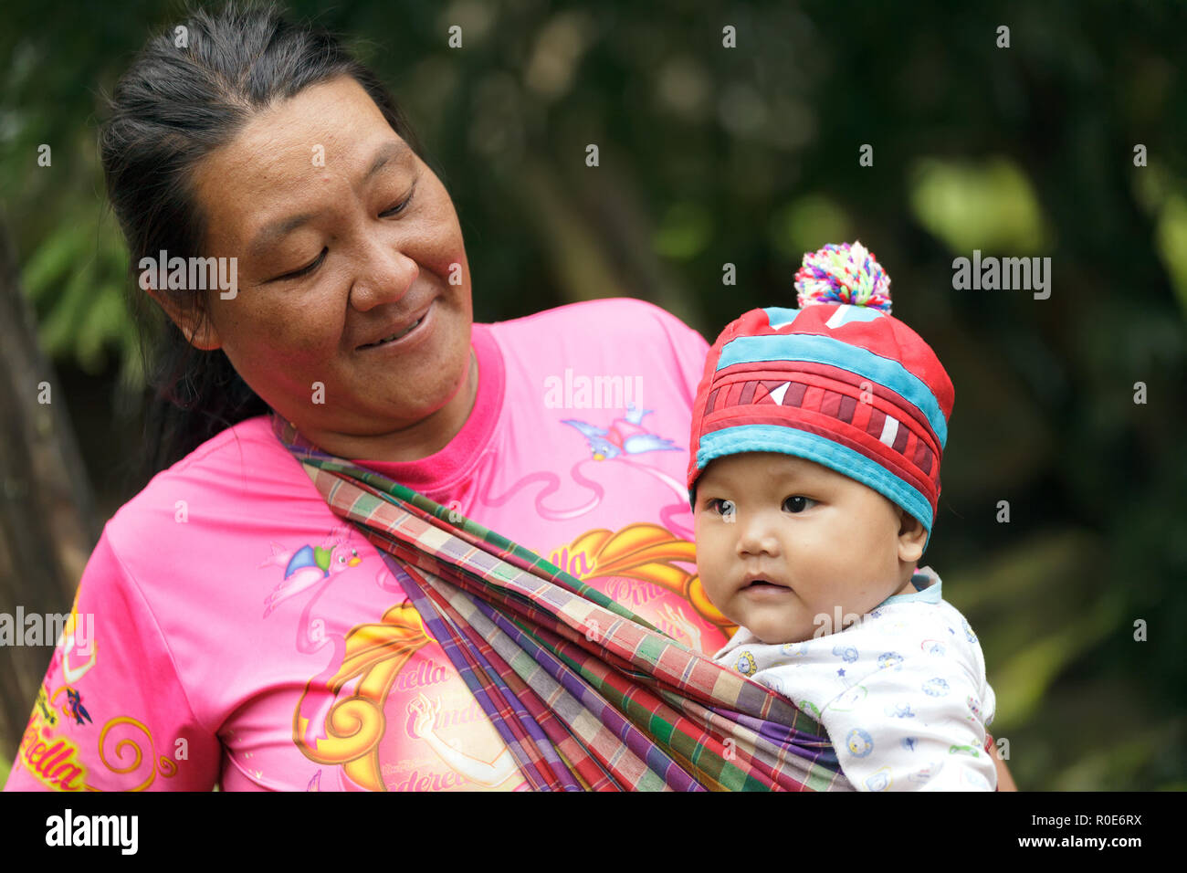 BAAN LOOK KAO LAM, THAILAND, NOVEMBER 20, 2012 : Unidentified mother ...