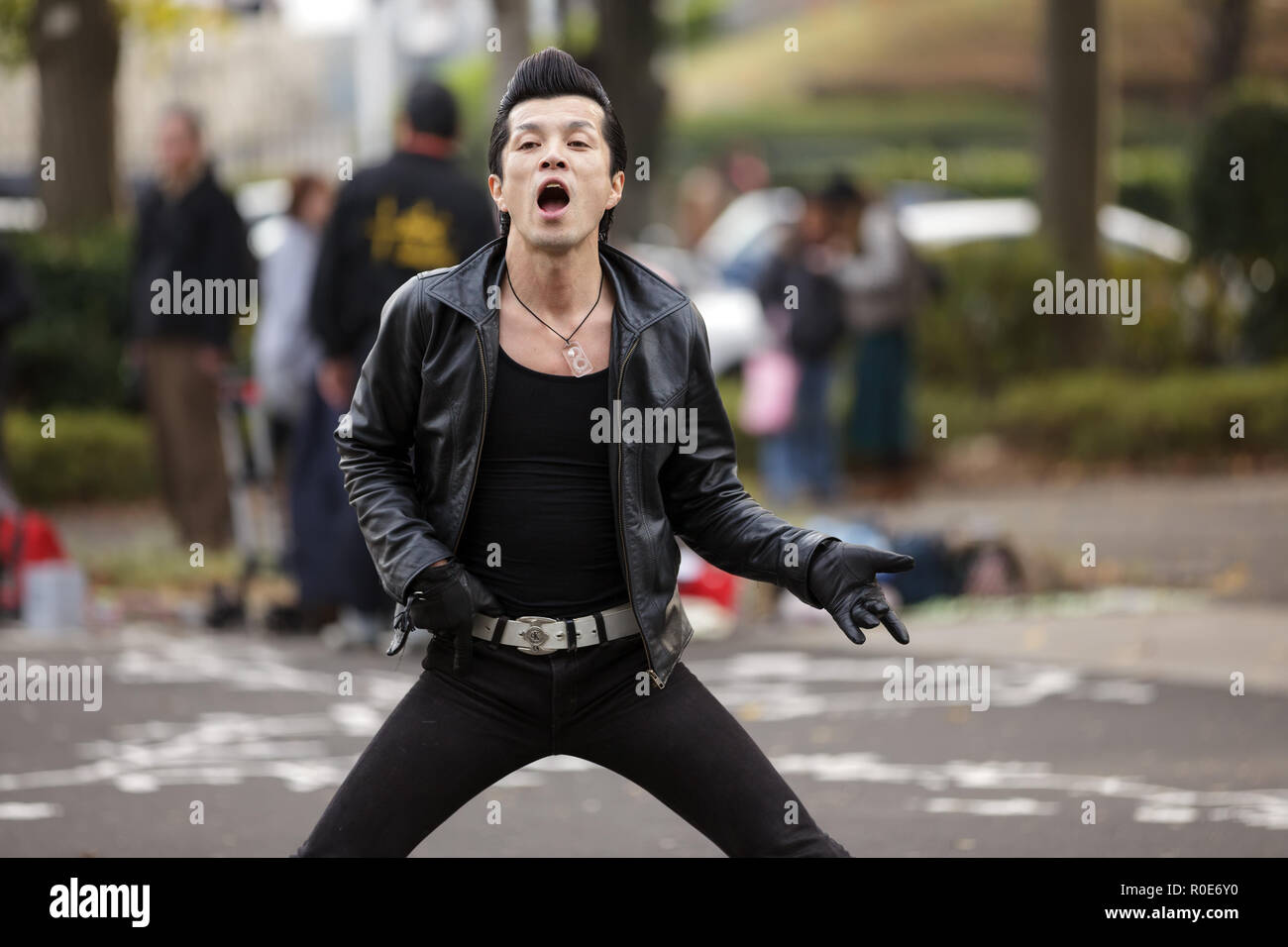 TOKYO, JAPAN, NOVEMBER 27, 2011: A rockabilly rebel is performing dance ...
