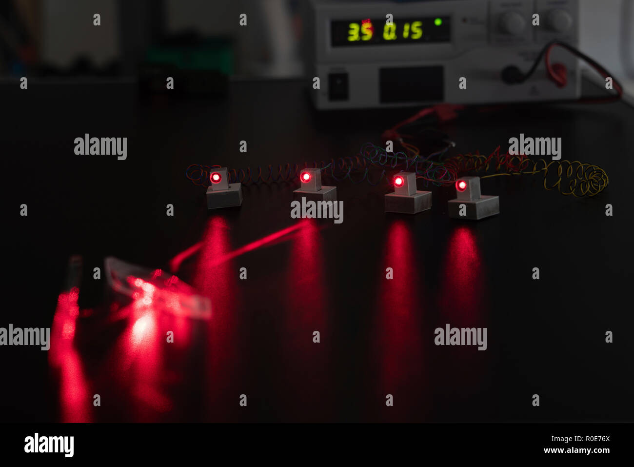 Laser experiment in photonics laboratory Stock Photo - Alamy